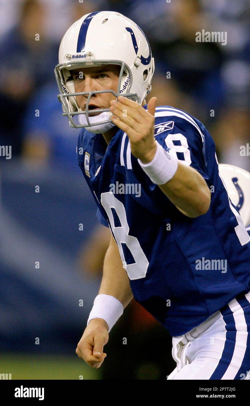 Indianapolis Colts quarterback Peyton Manning (18) audibles at the line ...