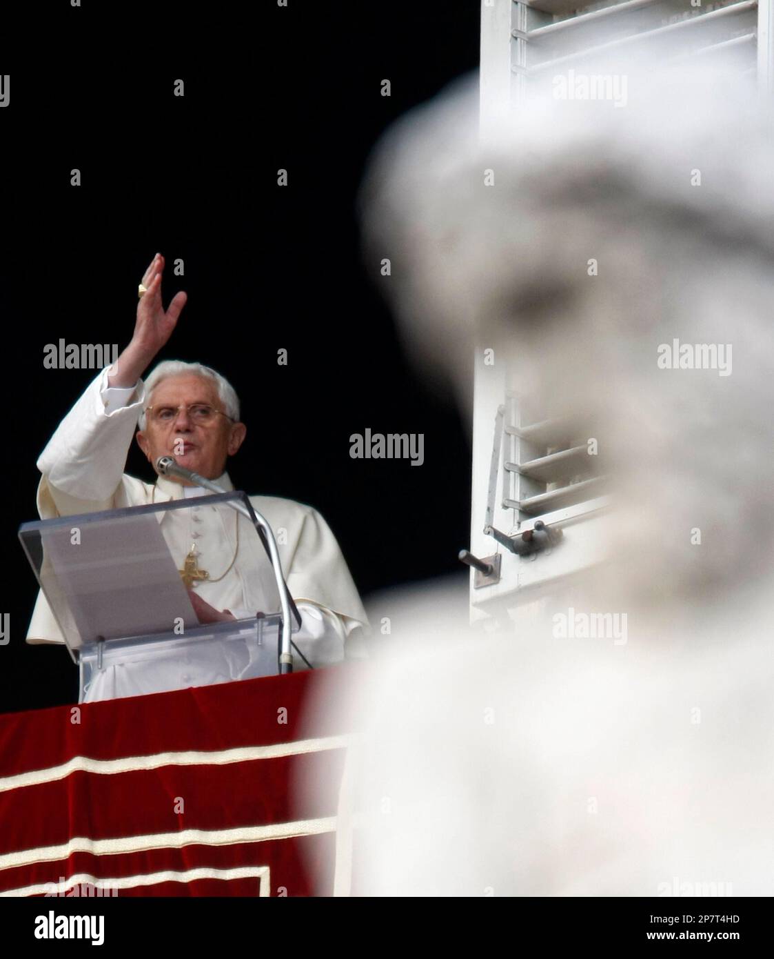 Pope Benedict XVI delivers his blessing during his weekly Angelus ...