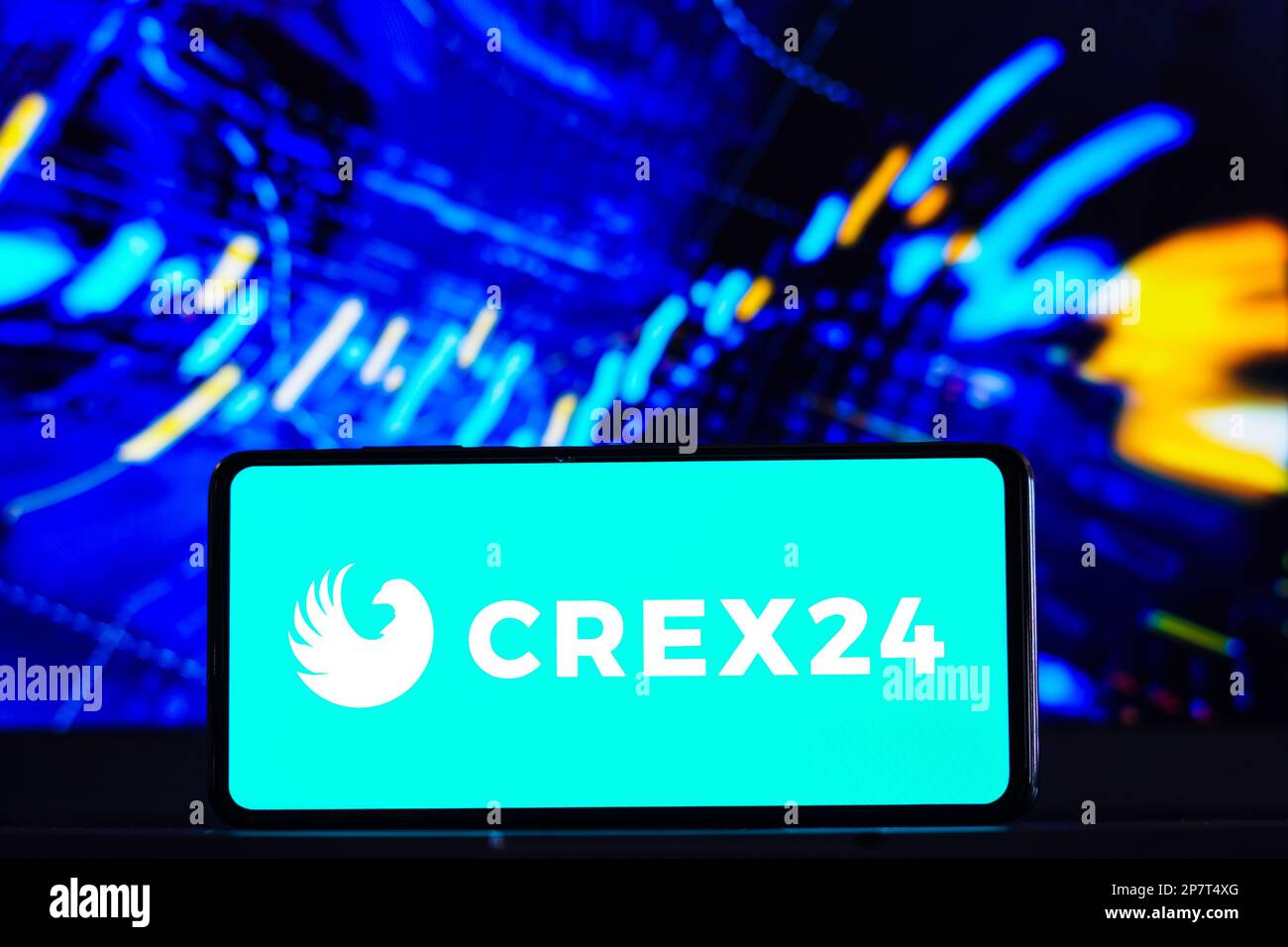 In this photo illustration, the Crex24 Exchange logo seen displayed on a smartphone Stock Photo ...