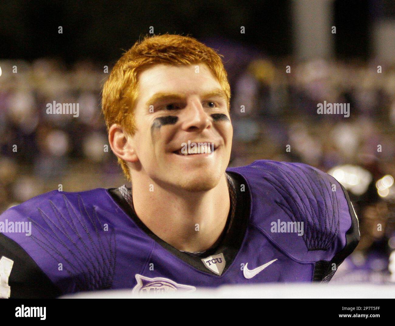TCU quarterback Andy Dalton smiles as the clock runs down in an NCAA ...