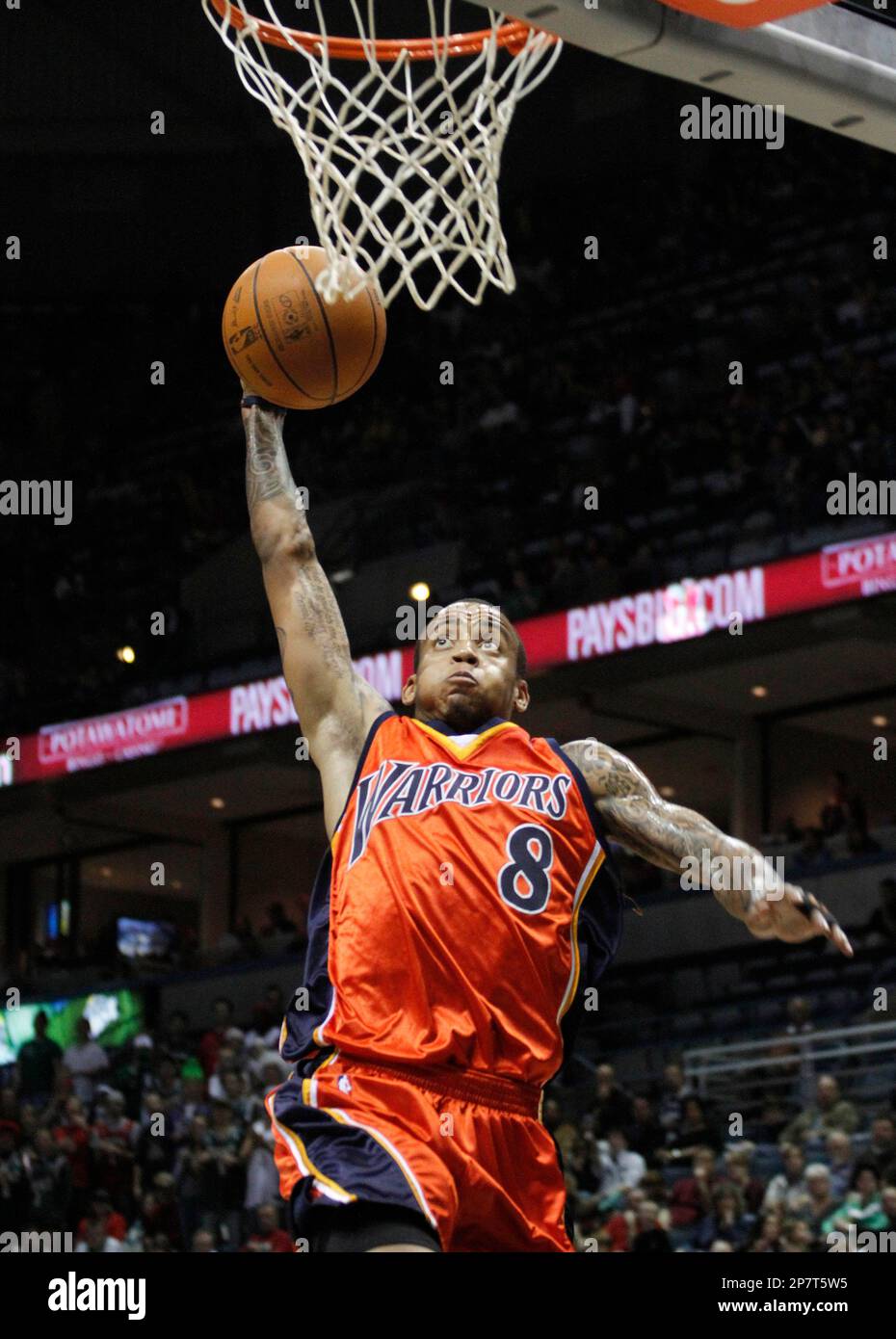 Golden State Warriors' Monta Ellis (8) soars in for a dunk against the ...