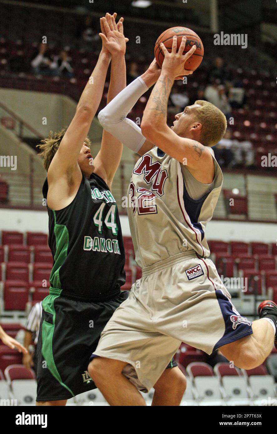 Loyola Marymount's Tim Diederichs(32) shoots in front of North Dakota's ...