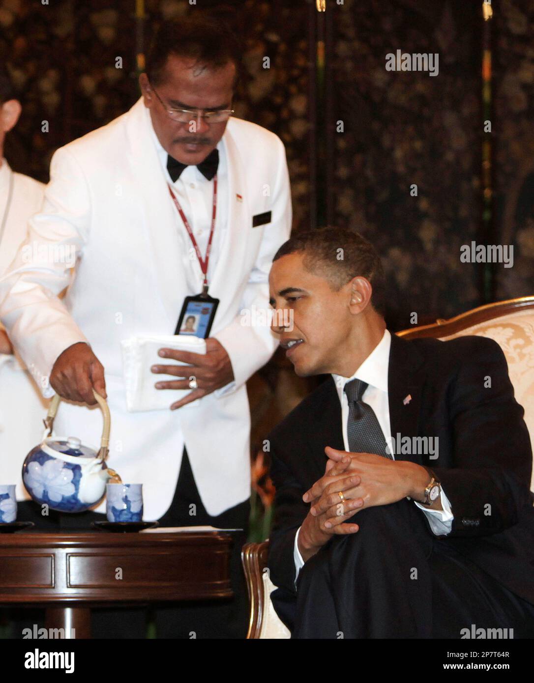 US President Barack Obama, right, is served tea during his bilateral ...