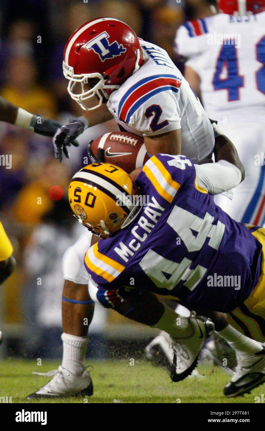 Louisiana Tech wide receiver Lyle Fitte (2) is stopped by LSU Curtis ...