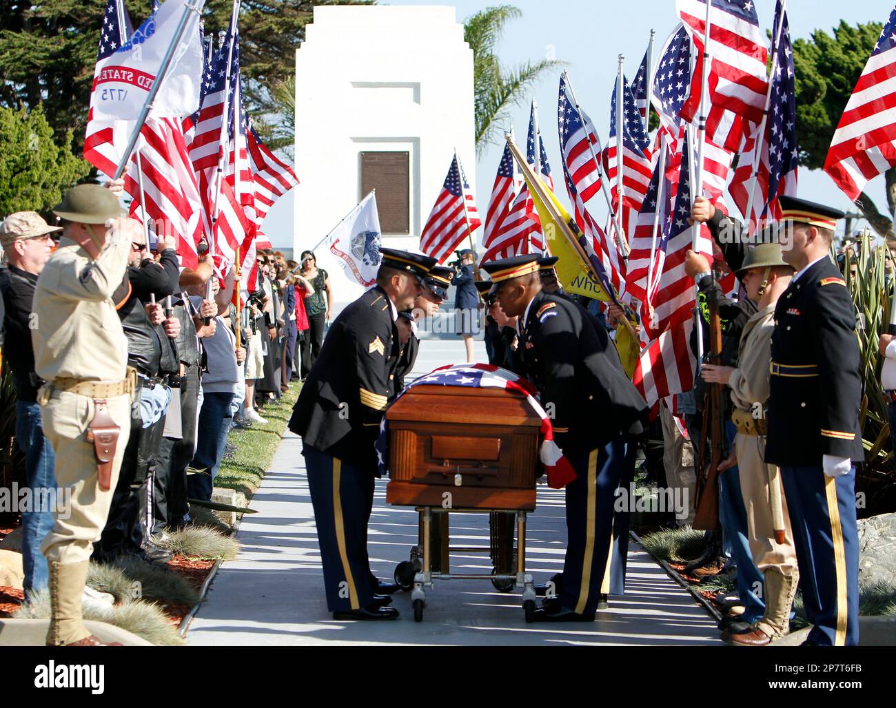 A California National Guard Honor Guard carries the casket of Fort Hood ...