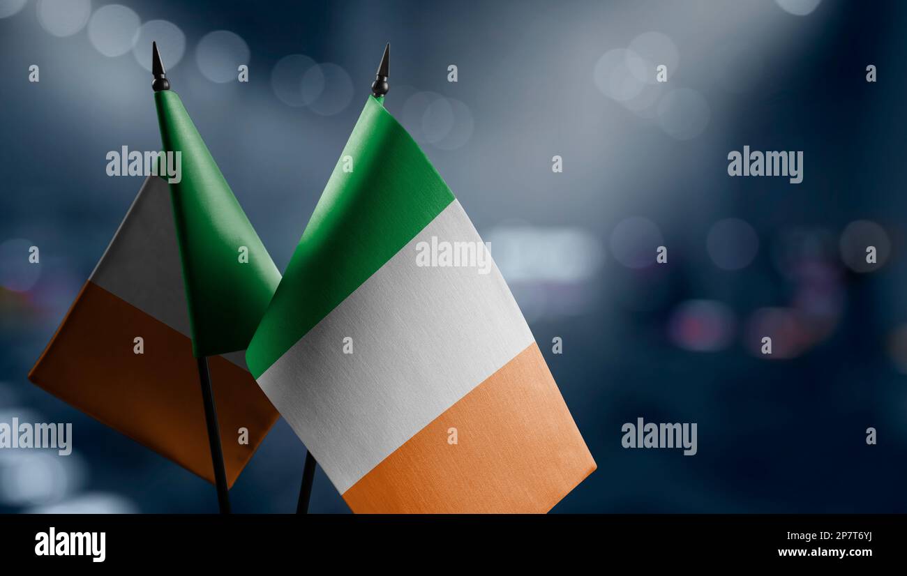 Small flags of the Ireland on an abstract blurry background Stock Photo ...