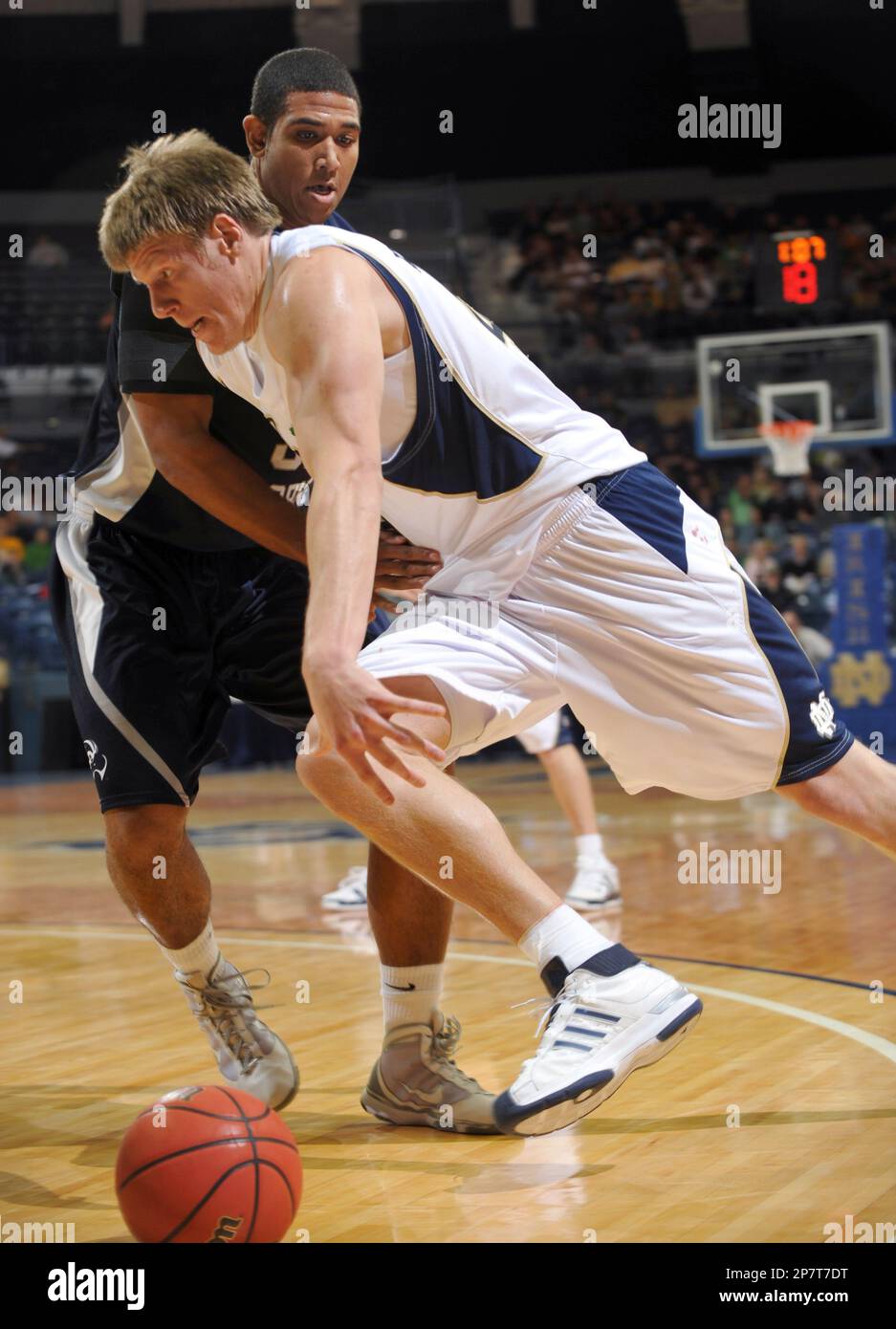 Notre Dame forward Luke Harangody drives the lane as North Florida ...