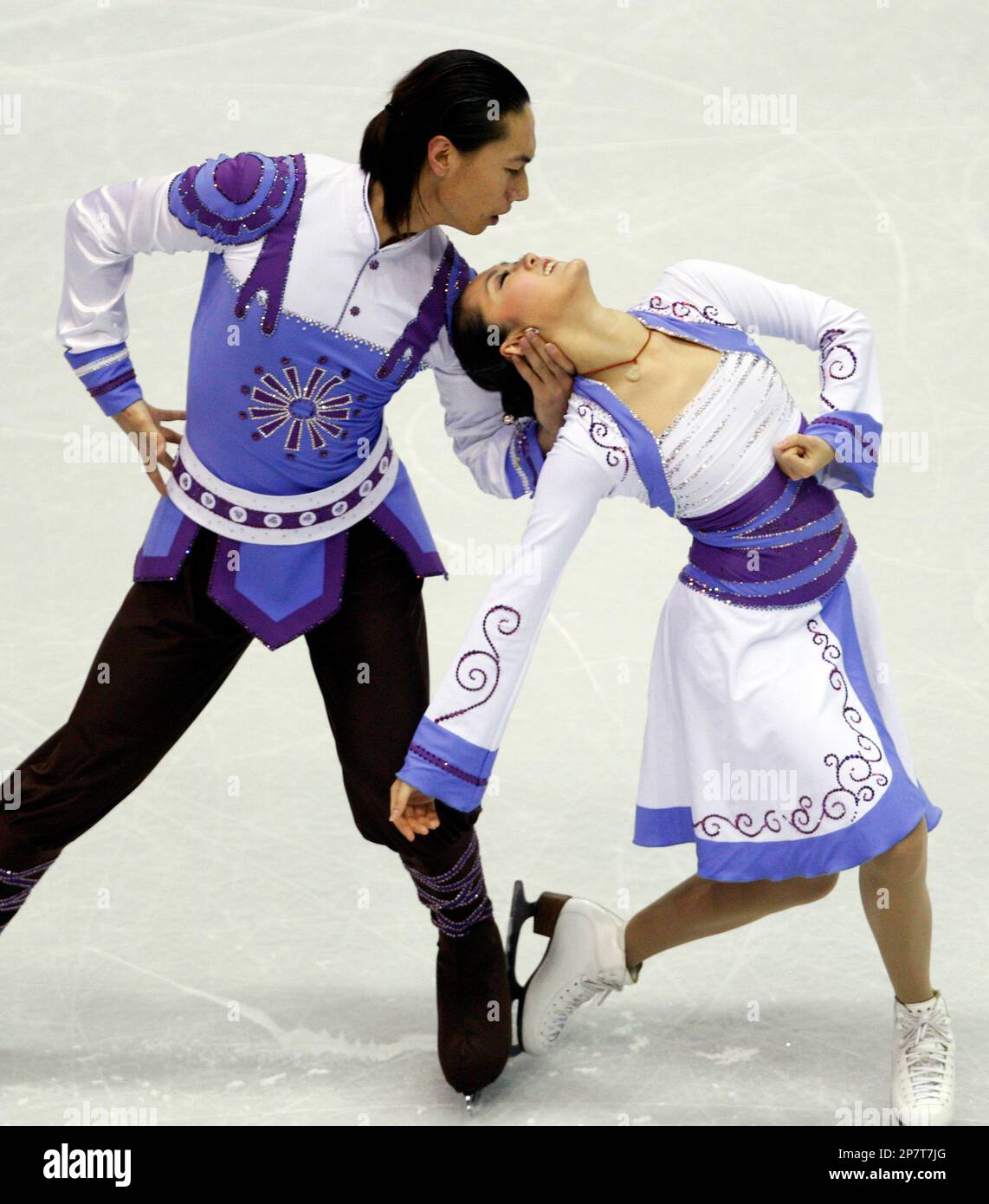 Yu Xiaoyang, right, and Wang Chen, of China, perform during ice dancing ...