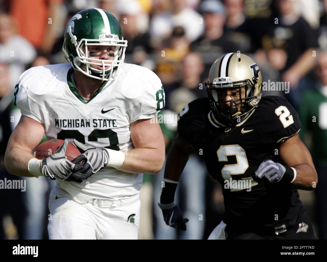 Michigan State tight end Charlie Gantt, left, picks up a 55-yards on a ...
