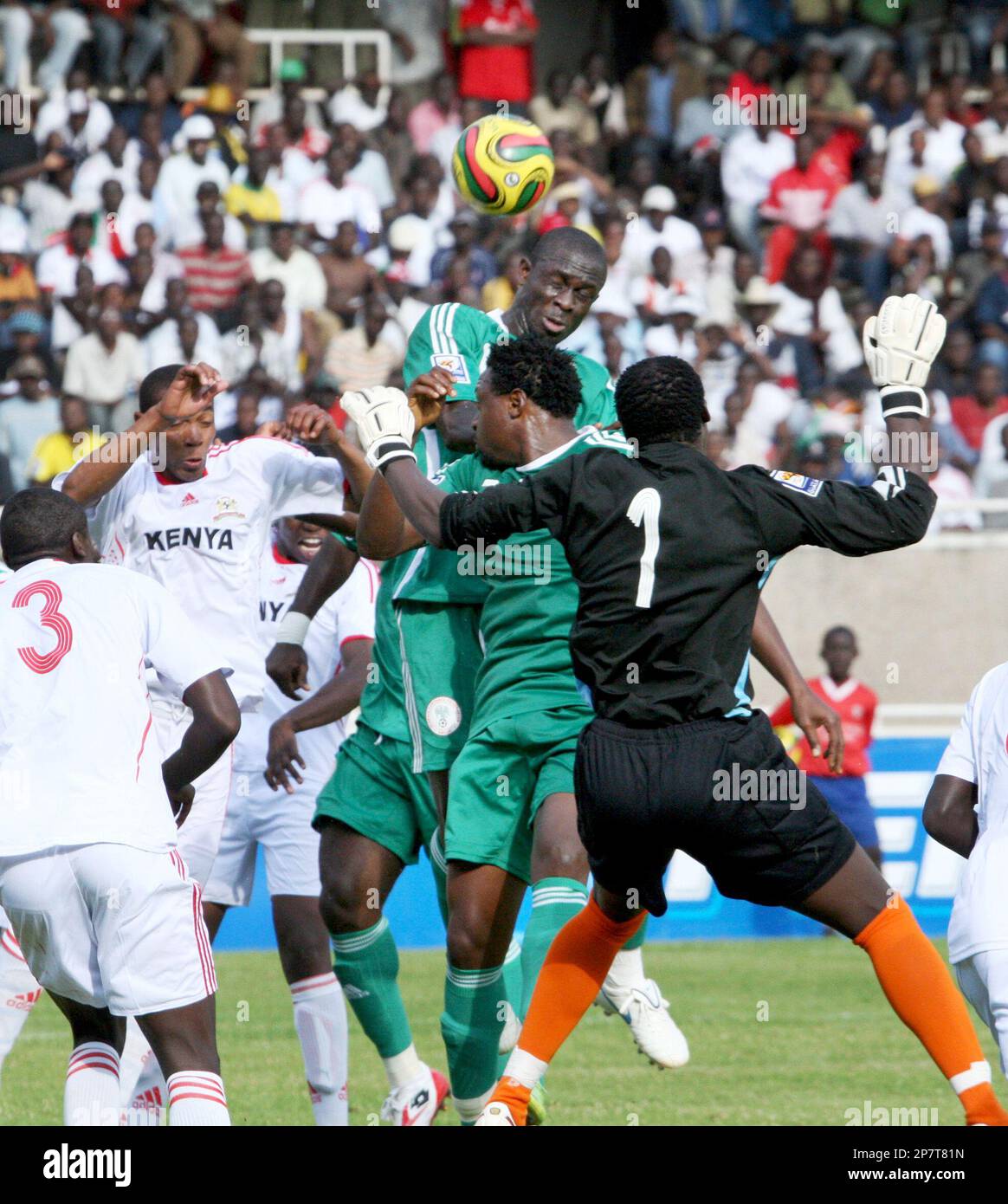 Kenyan goalkeeper Willis Ochieng, right, in action with teammates and ...