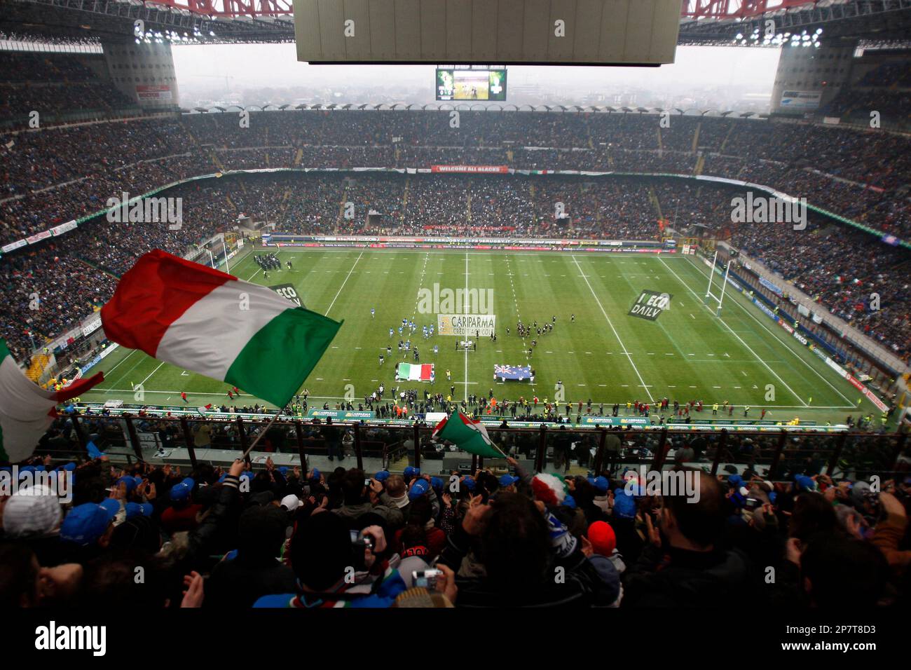 Italy and New Zealand's teams line up on the pitch prior to the kick ...