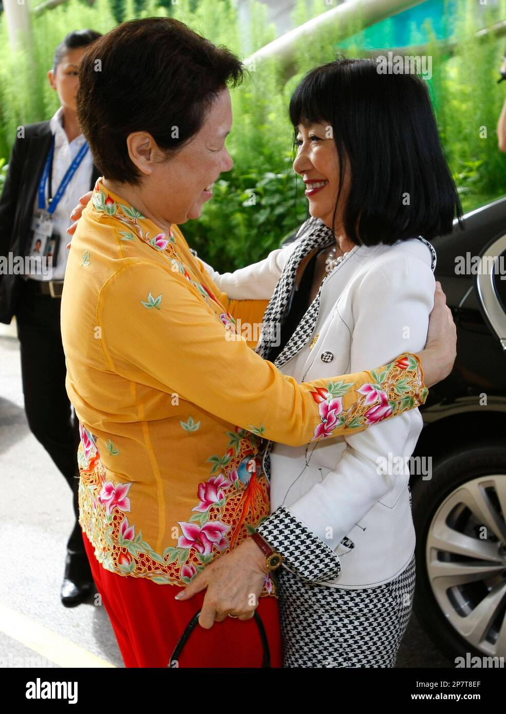 Japanese prime minister Yukio Hatoyama's wife Miyuki, right, is greeted ...