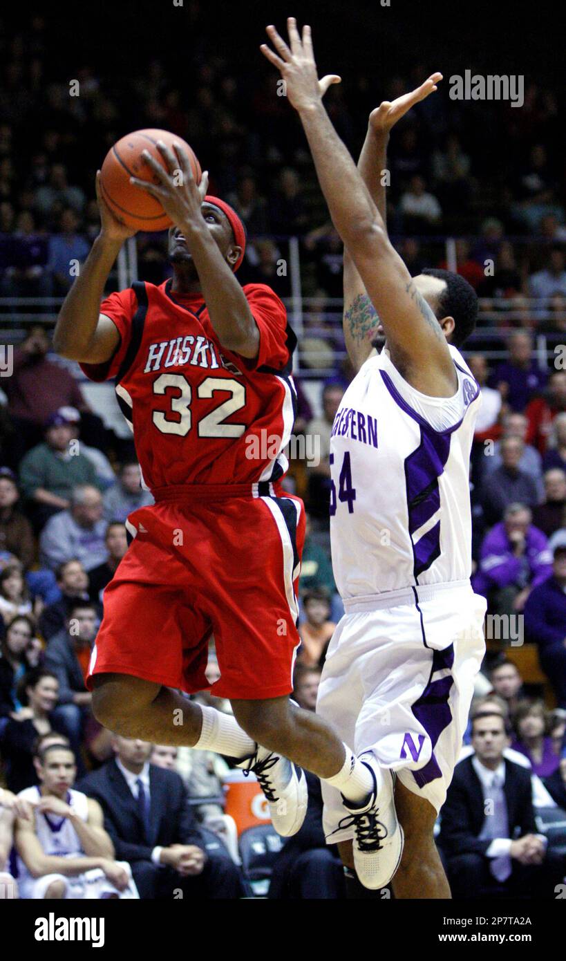 Northern Illinois' Darion Anderson, left, drives to the basket past ...