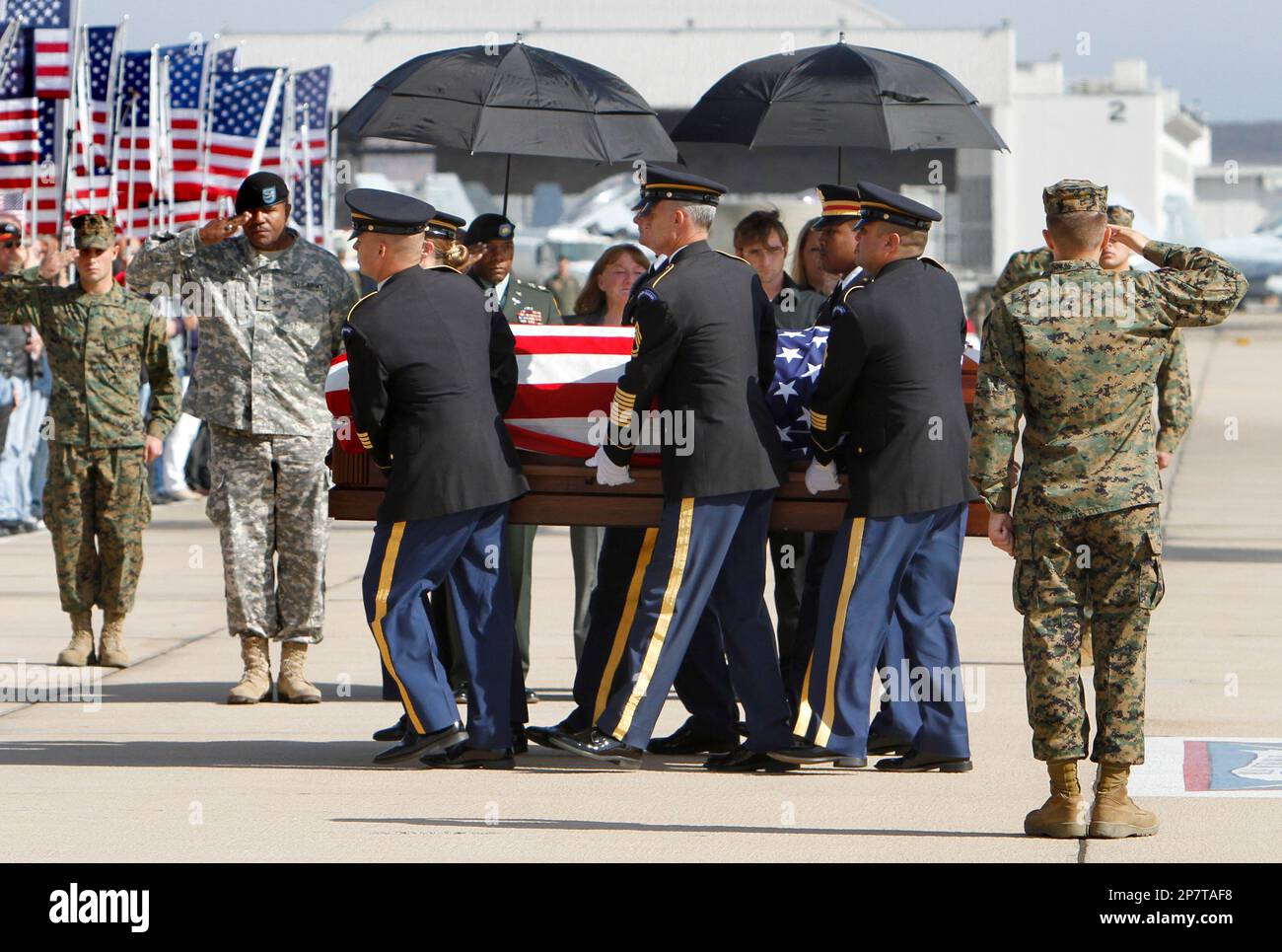 The casket carrying the body of Fort Hood victim Capt. John Paul ...