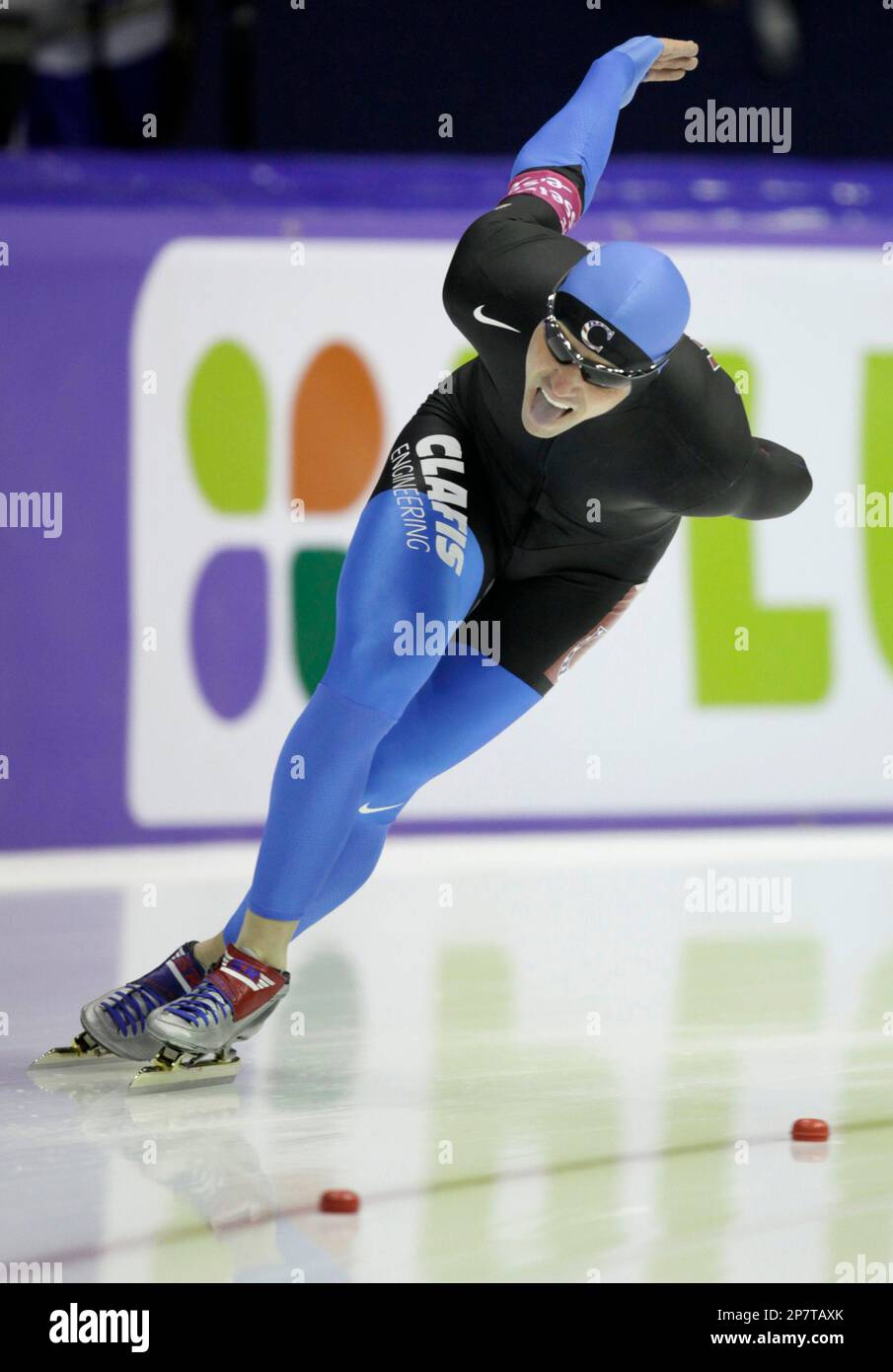 Chad Hedrick of the U.S. strains during the 1500 meters men's race of ...