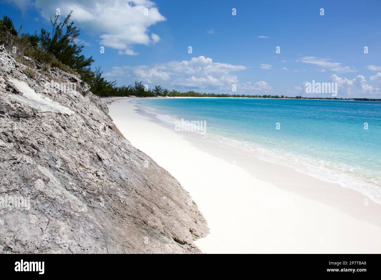 The scenic view of an empty sandy beach on Half Moon Cay tourist island ...