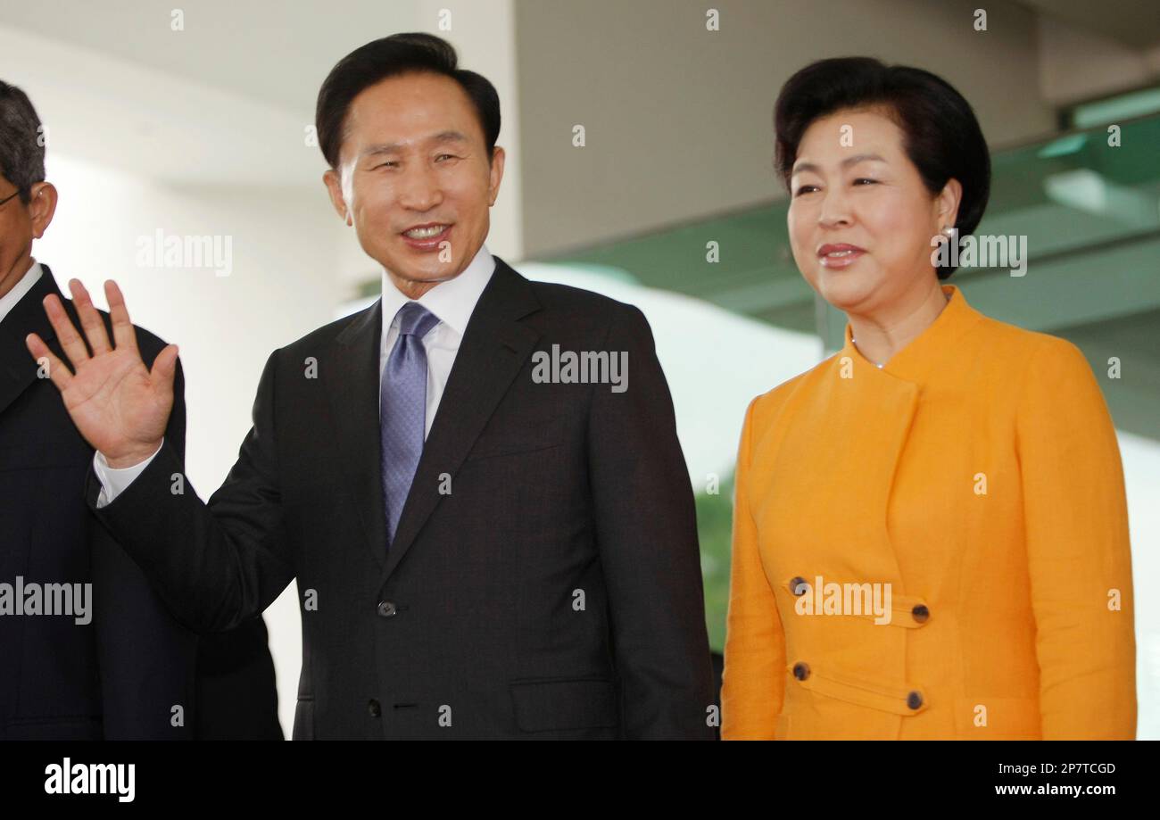South Korean President Lee Myung-Bak and his wife Kim Yoon arrive at ...