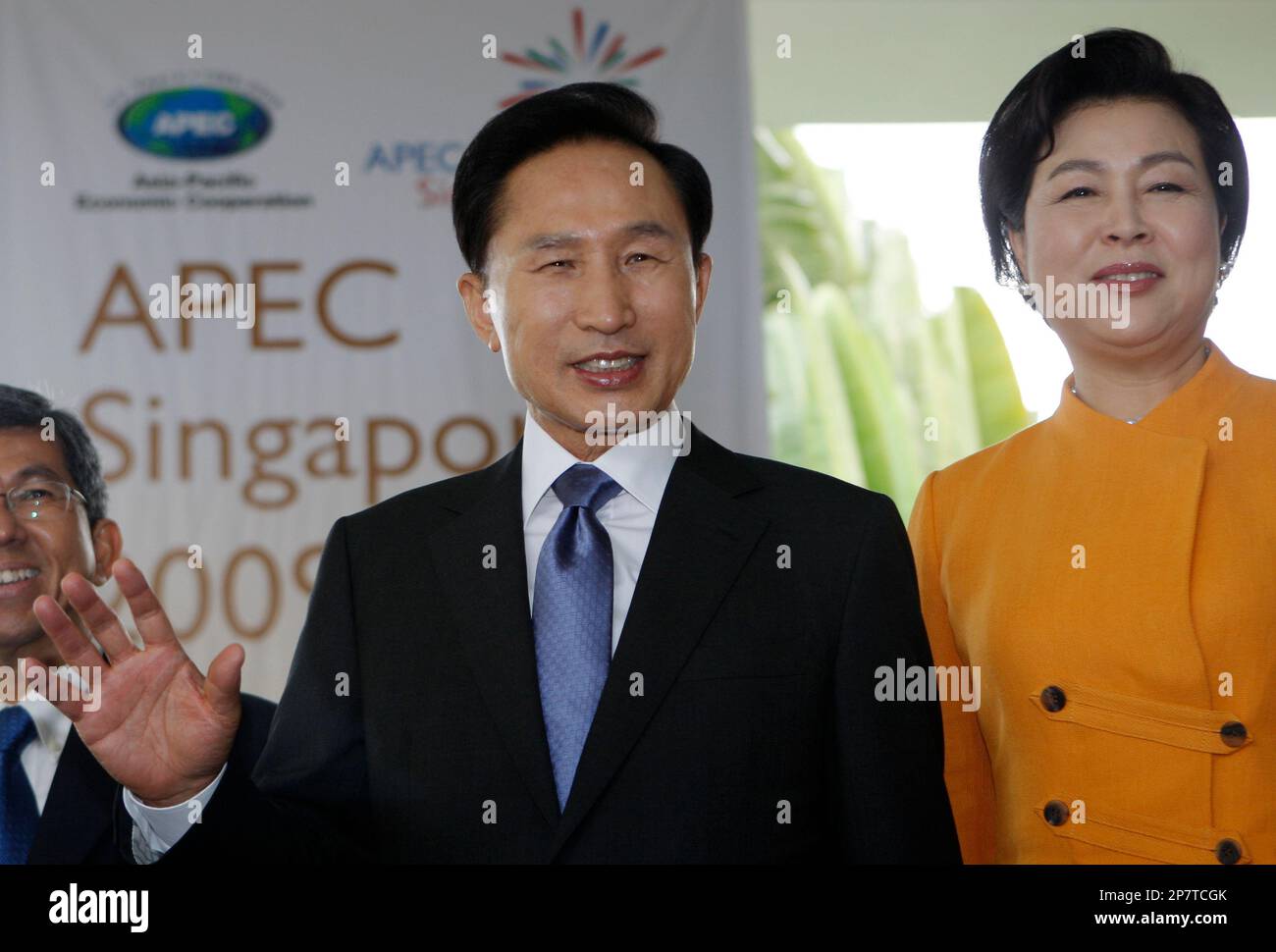 South Korean President Lee Myung-Bak and his wife Kim Yoon arrive at ...