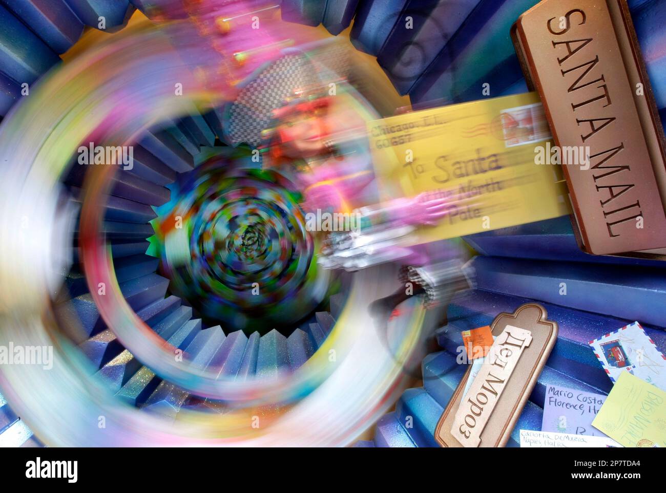 In this prolonged exposure, one of Santa's mail elves deposits a letter ...