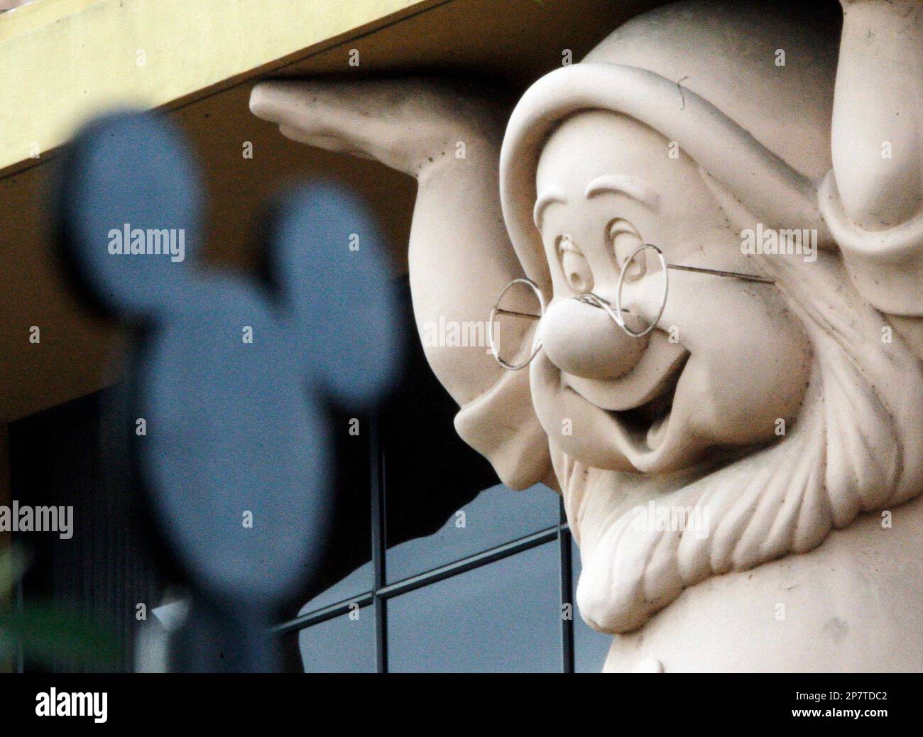 A smiling Doc, one of the Seven Dwarfs from the 1930s Disney classic ...