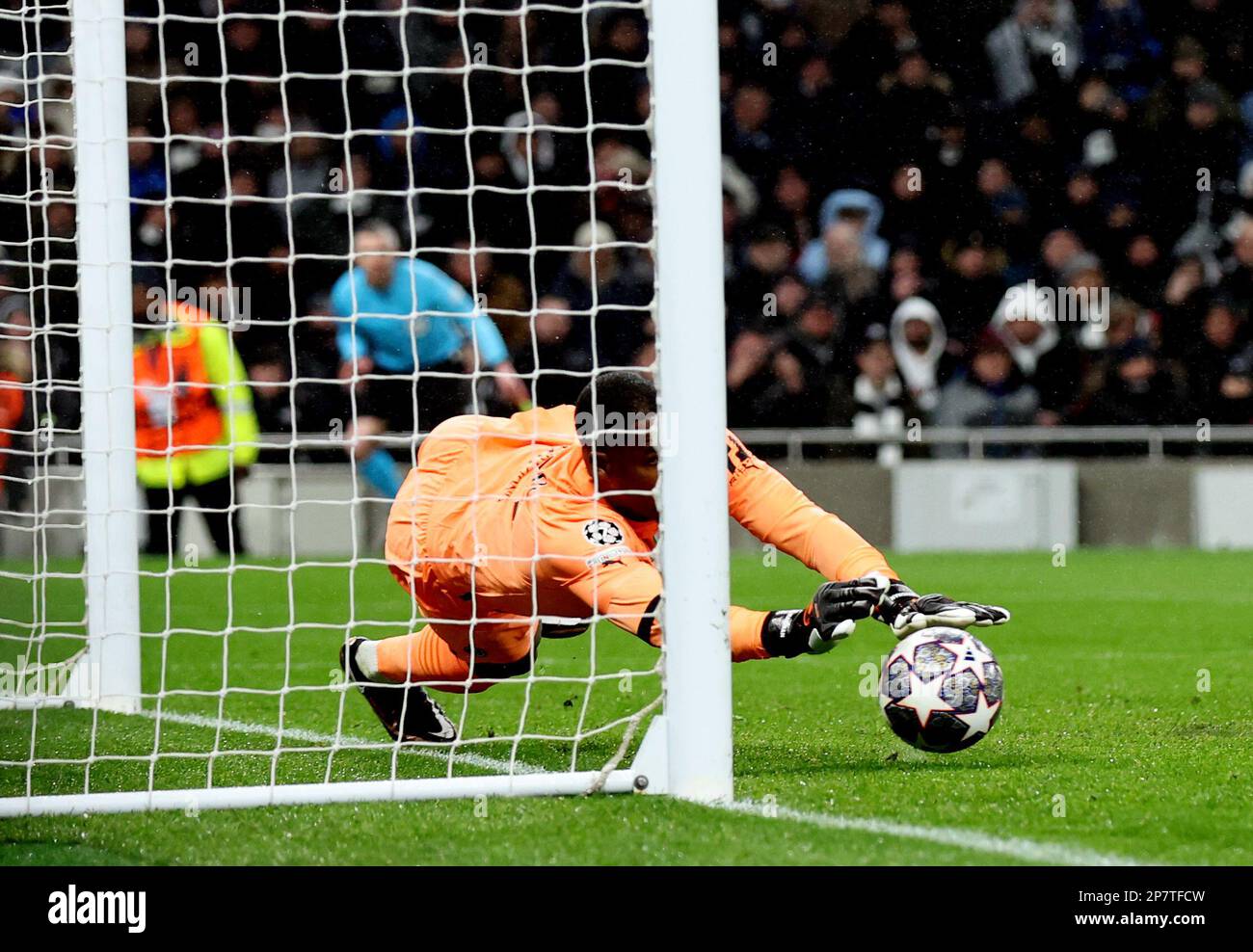 London, UK. 8th Mar, 2023. Mike Maignan of AC Milan makes a save from ...