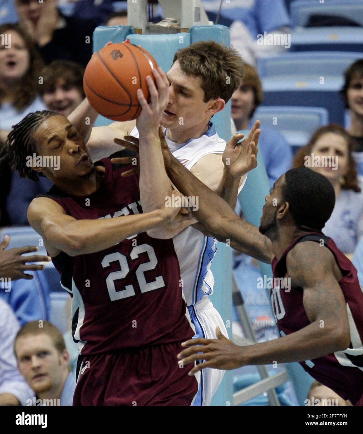 North Carolina's Tyler Zeller, center, battles with North Carolina ...