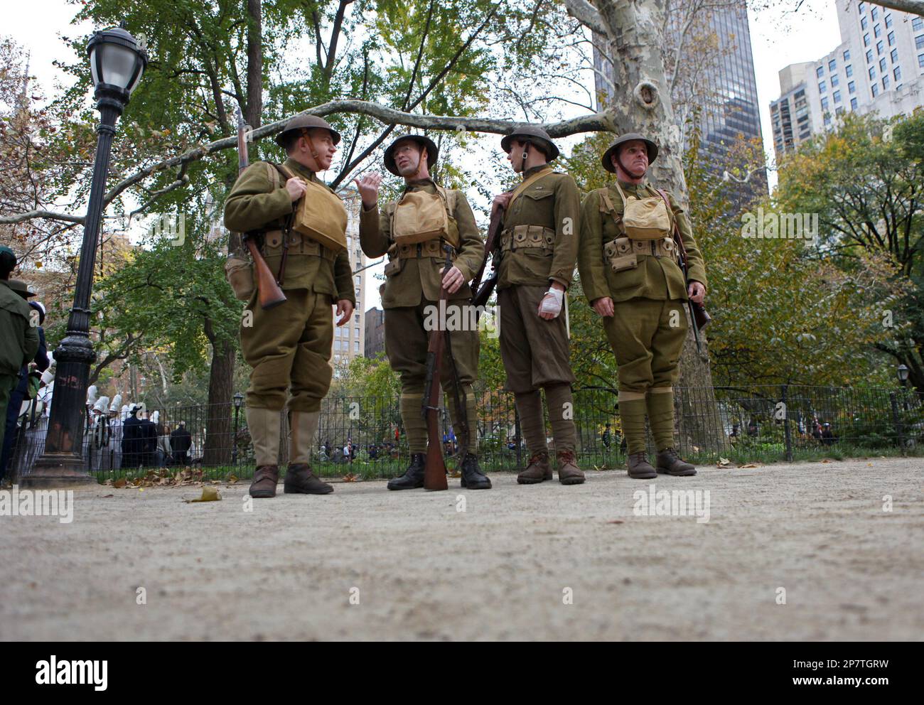 World War I re-enactors, from left to right, Paul Martinello, David ...