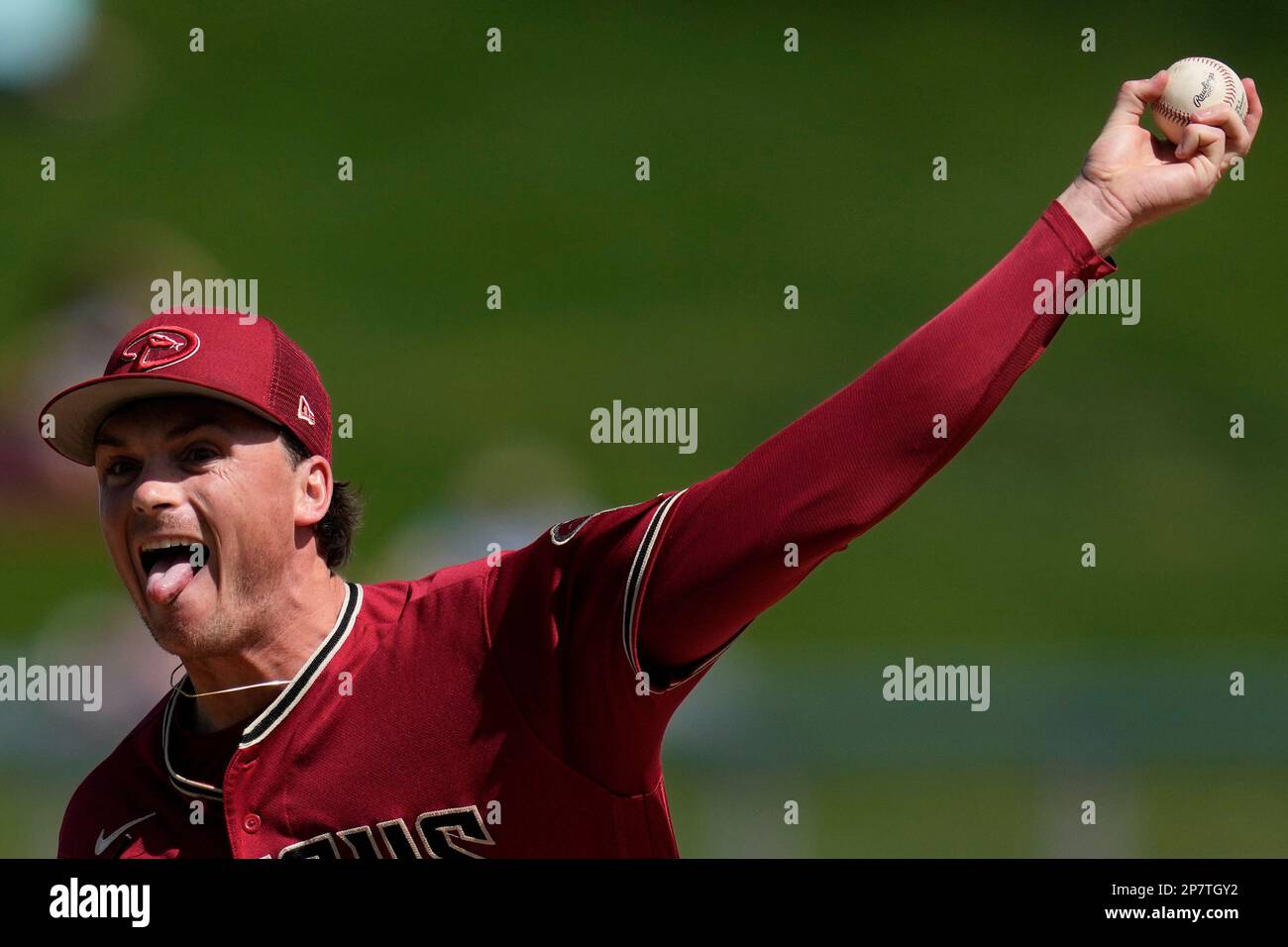 Arizona Diamondbacks starting pitcher Tommy Henry (47) throws during ...