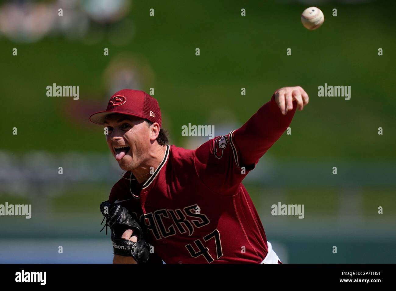 Arizona Diamondbacks starting pitcher Tommy Henry (47) throws during ...