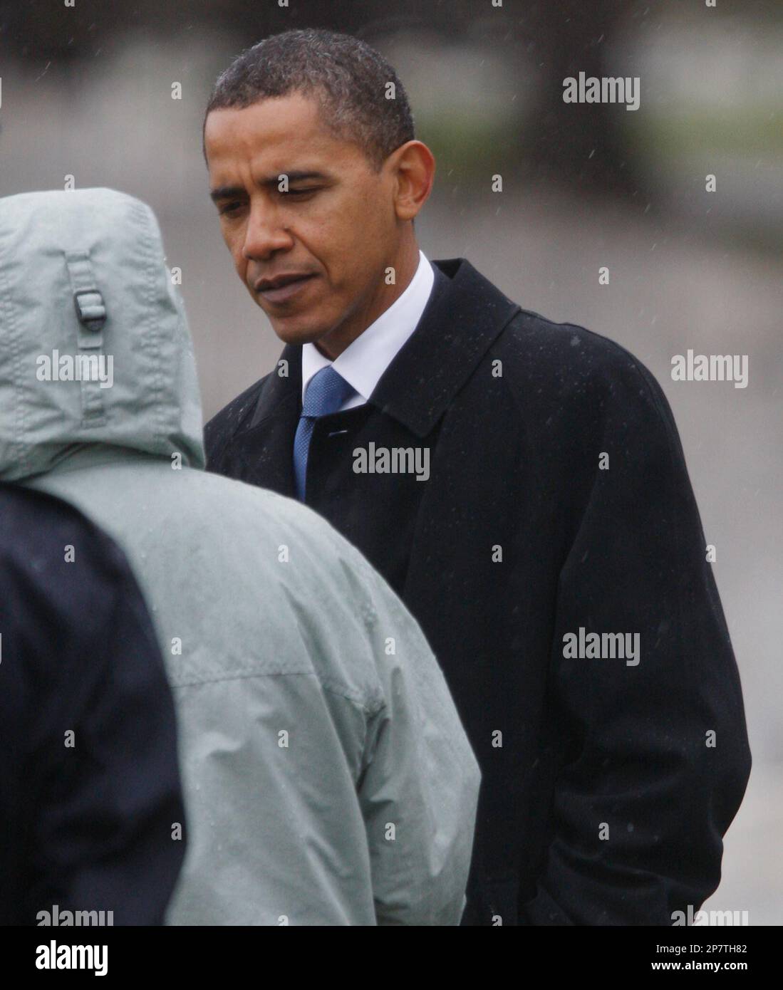 President Barack Obama meets with a visitor to Section 60 at Arlington ...