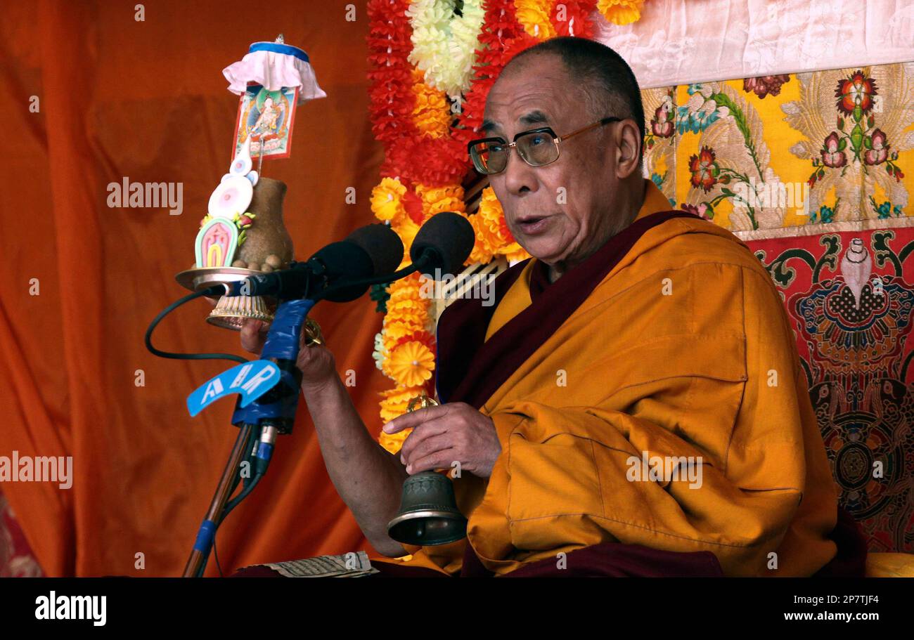 Tibetan spiritual leader the Dalai Lama performs religious rituals on ...