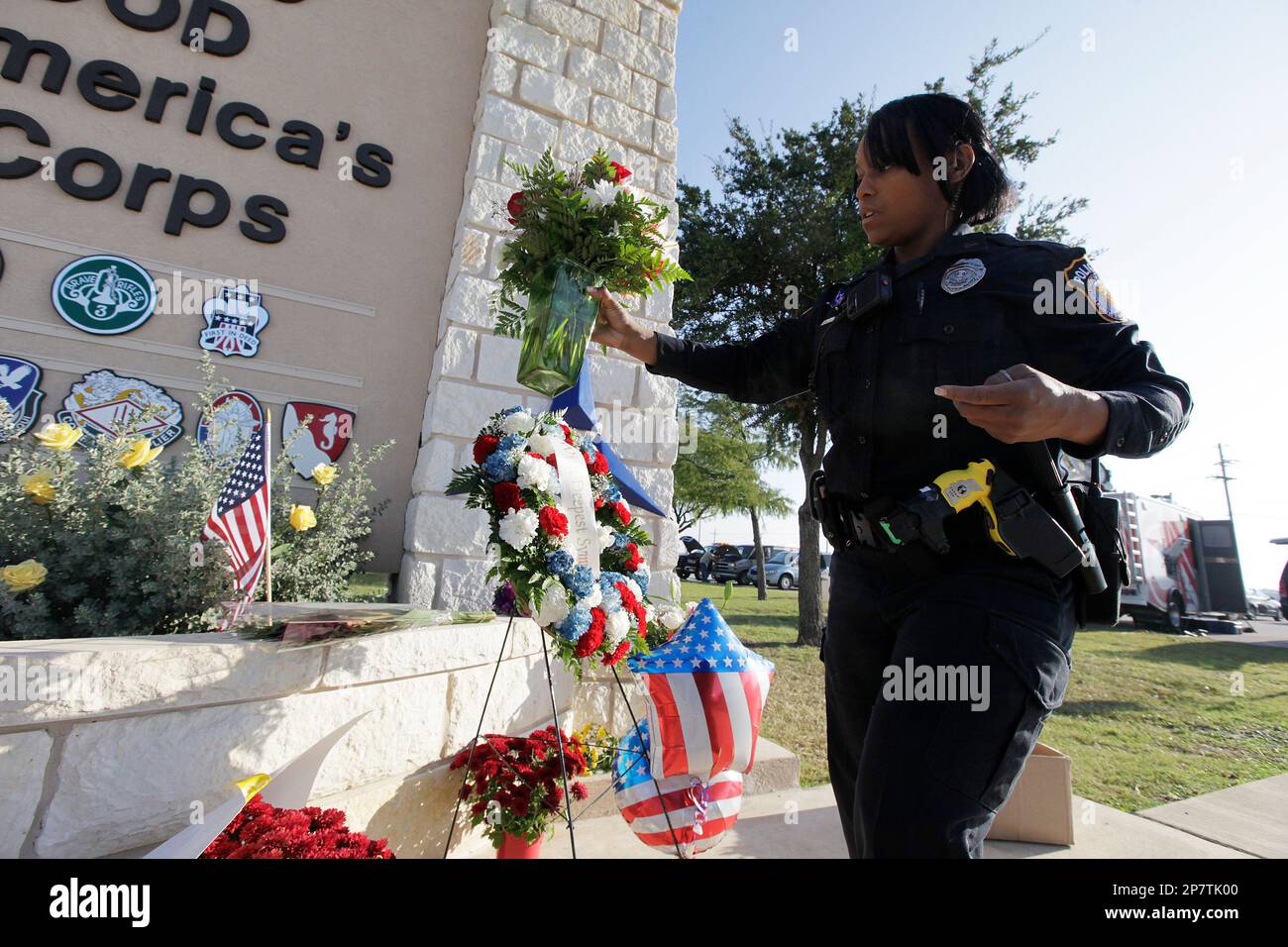 Sgt. Erica Shubrick with the Fort Hood Police Department delivers ...