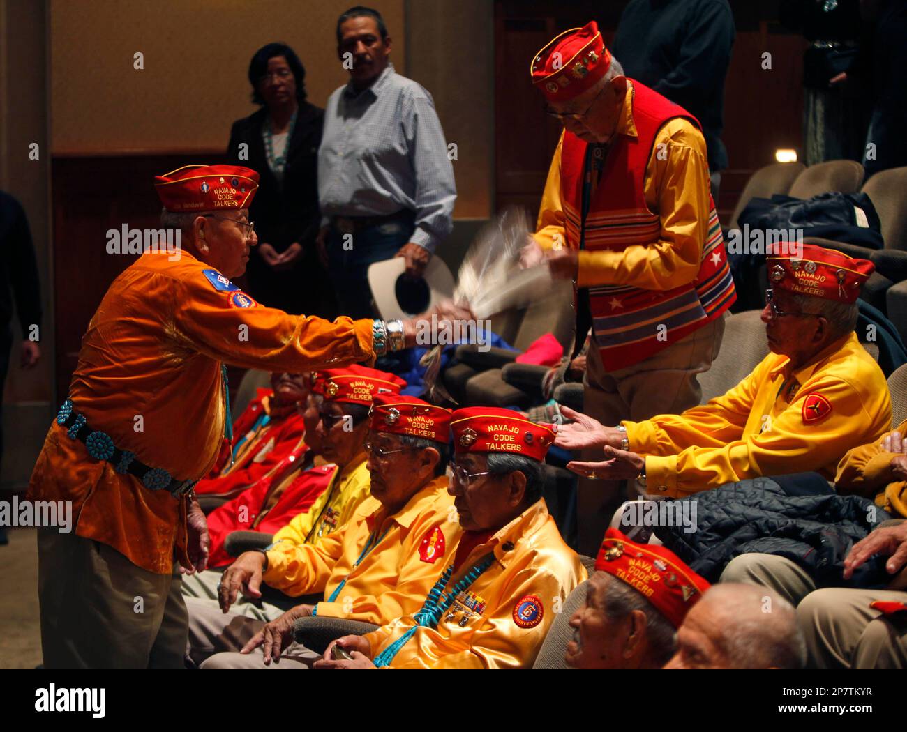Veteran and Navajo Code Talker Joe Vandever, left, performs a Navajo ...