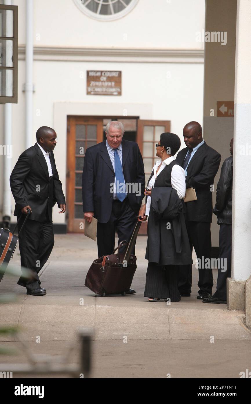 Roy Bennet, centre and his legal team,on the second day of his trial at ...
