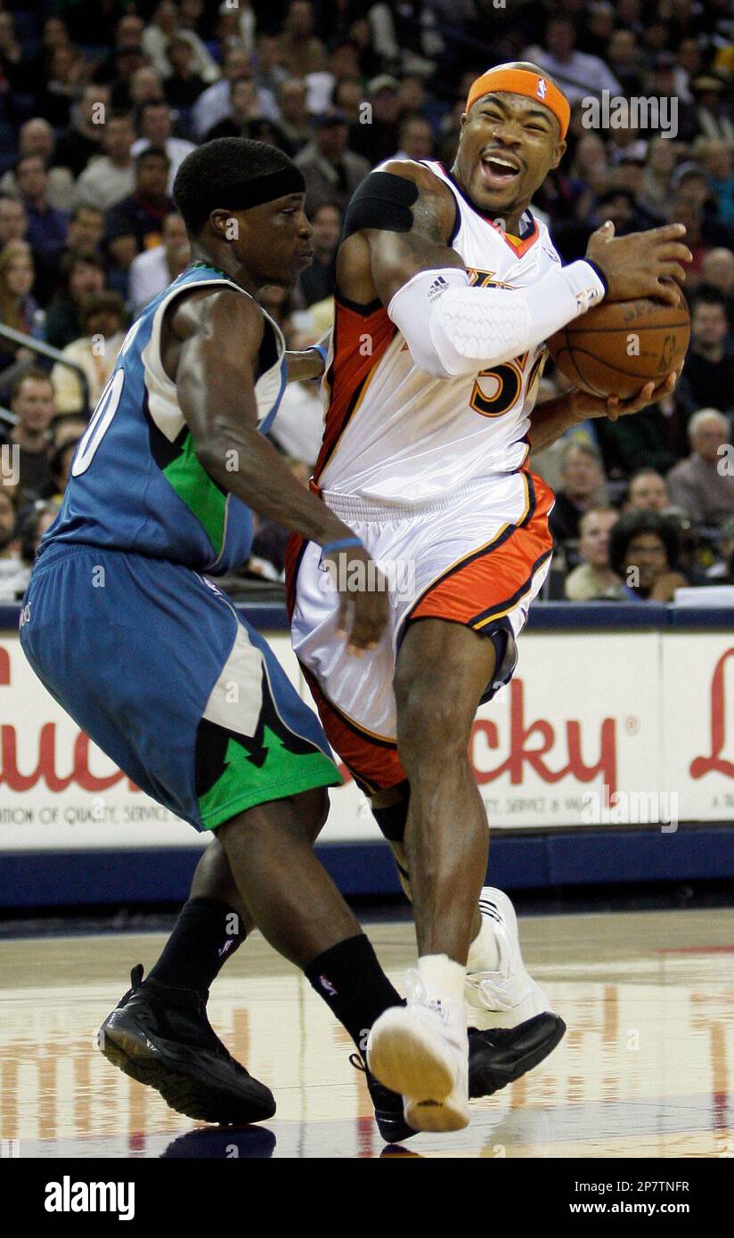 Golden State Warriors forward Corey Maggette (50), right, drives on ...