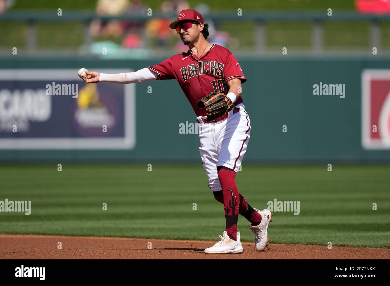 Arizona Diamondbacks second baseman Josh Rojas (10) throws to first to ...