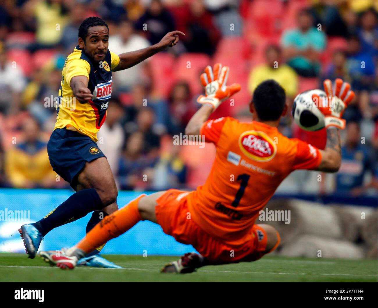 America's Jean Beausejour, of Chile, left, looks on as Monterrey's ...
