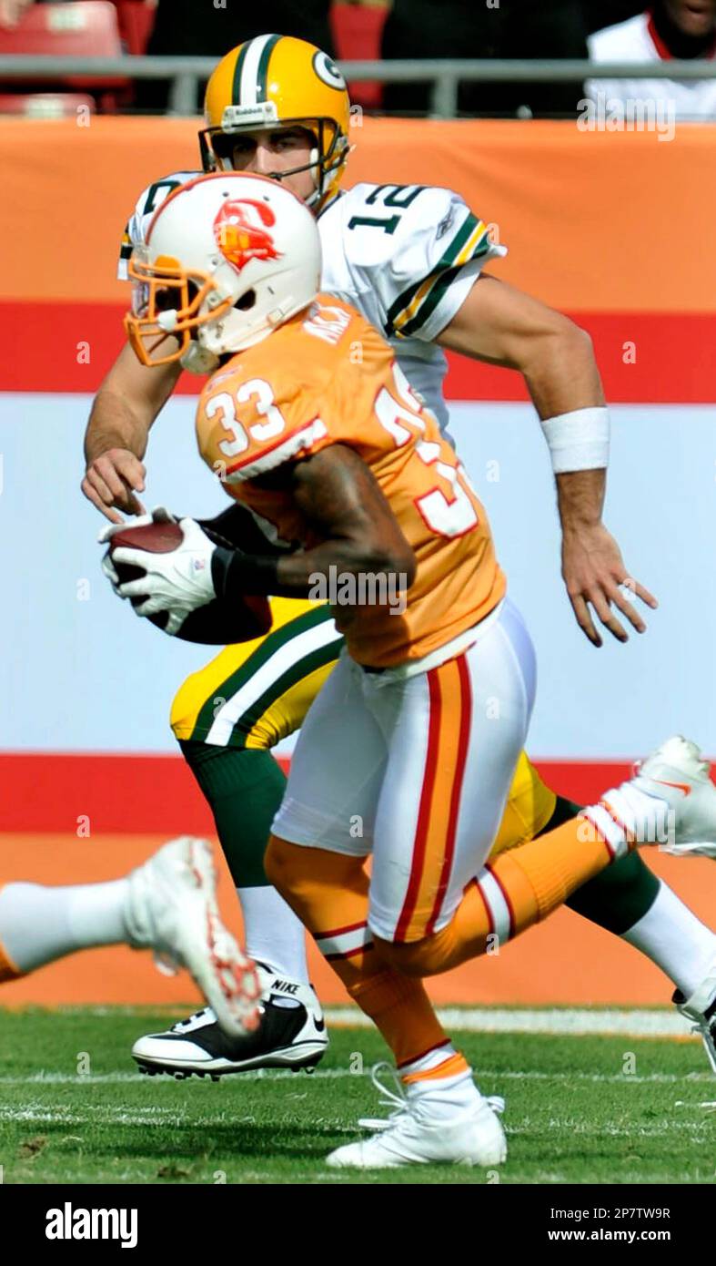 Green Bay Packers quarterback Aaron Rodgers (12) chases Tampa Bay ...