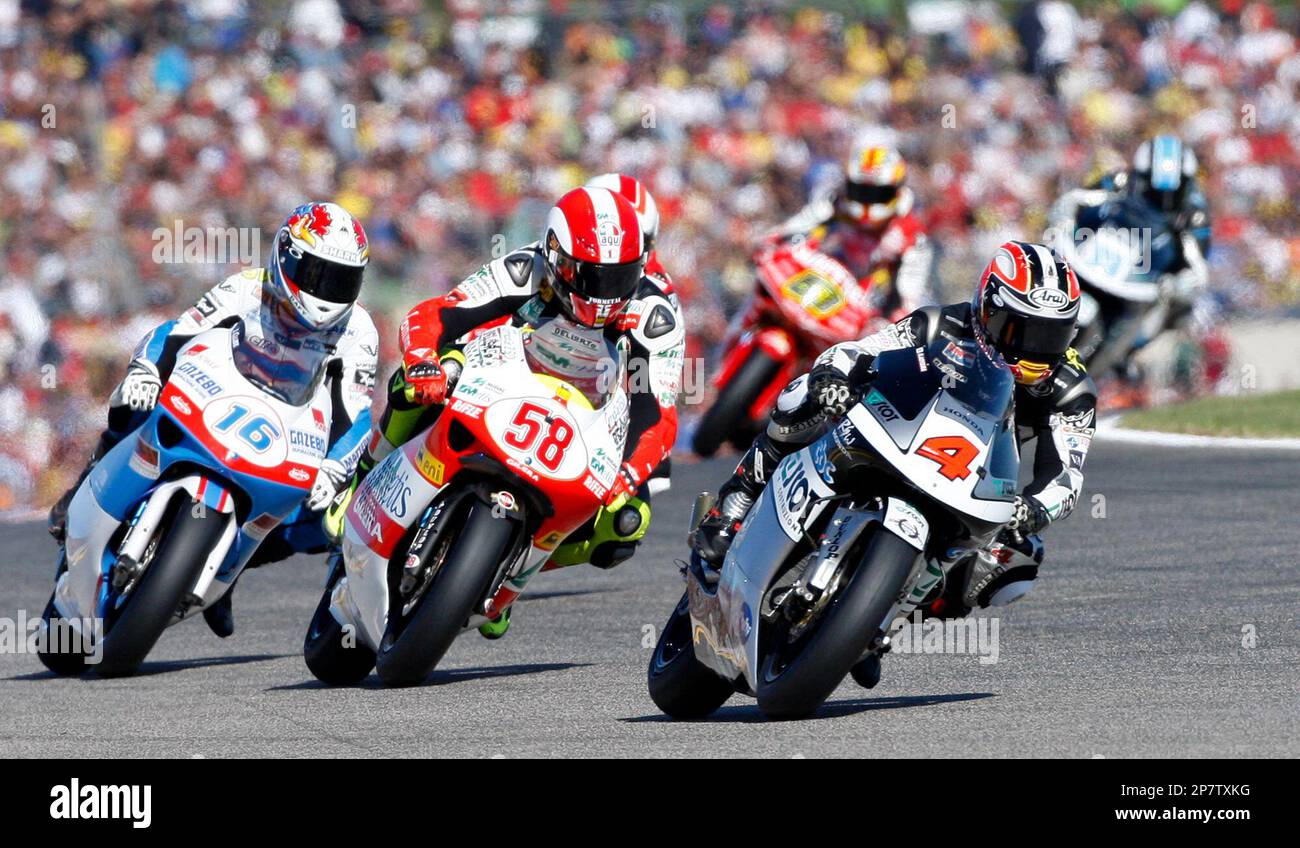 250cc Honda rider Hiroshi Aoyama of Japan, right, leads 250cc Gilera ...