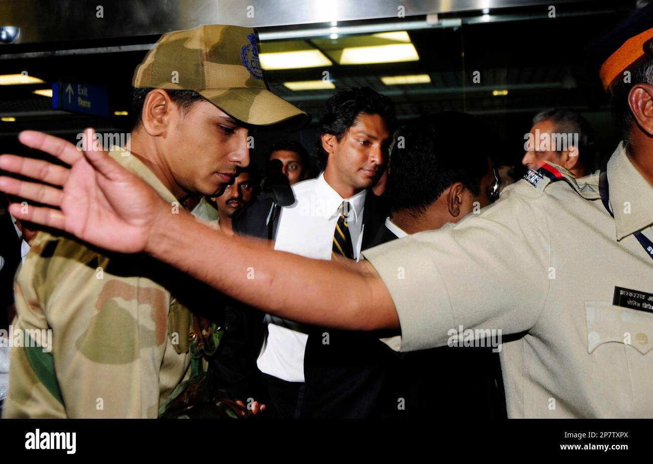 Indian security personnel guards as Sri Lankan cricket captain Kumar ...