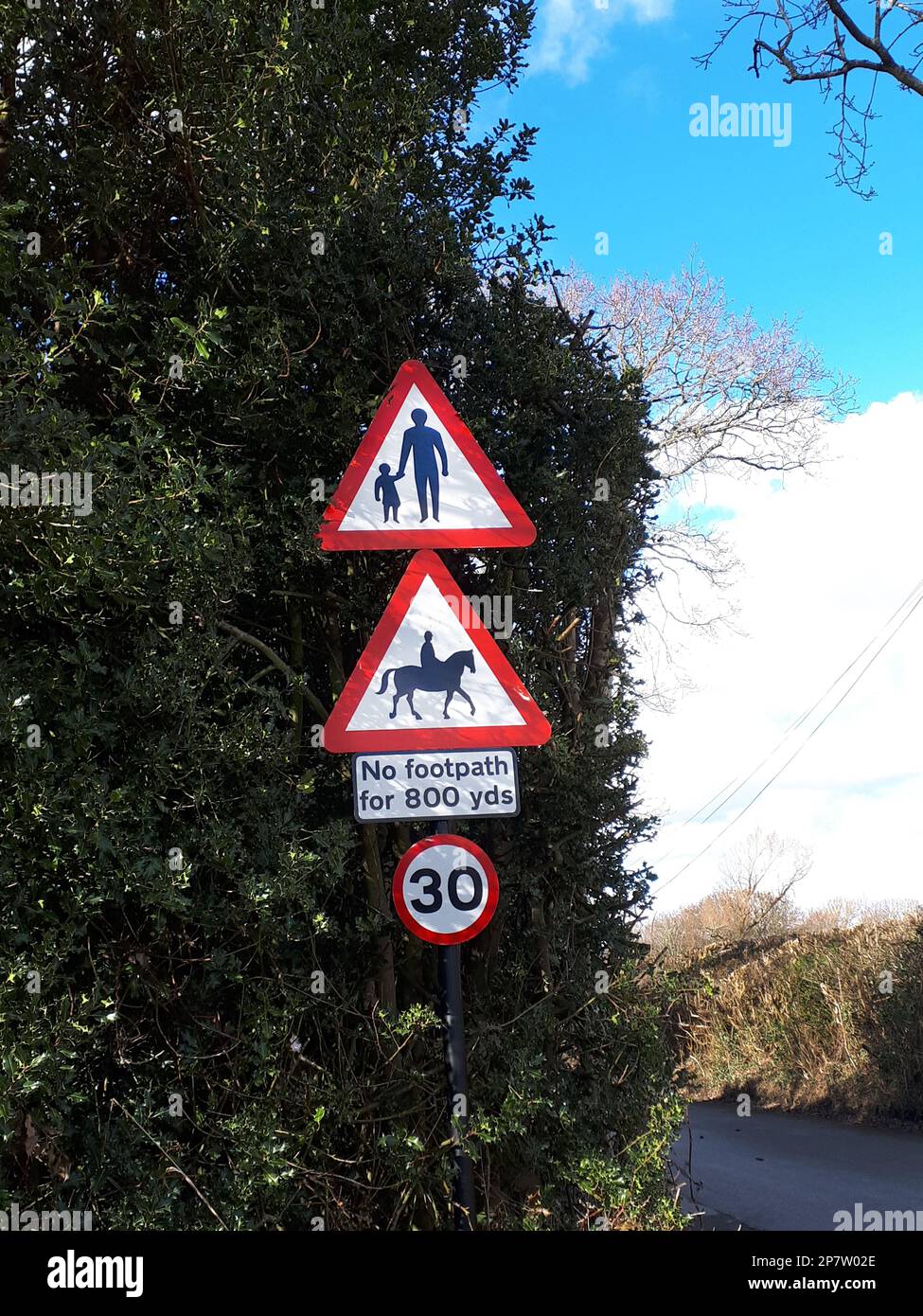 Traffic Warning sign on a country road with high hedges in Burnley ...