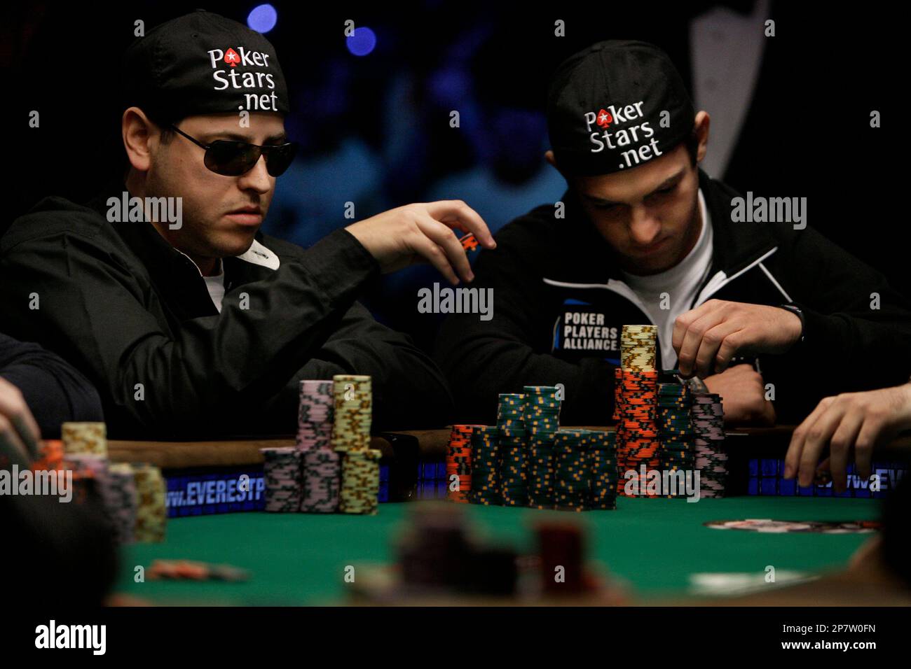 Eric Buchman and Joseph Cada play a hand at the final table of the ...