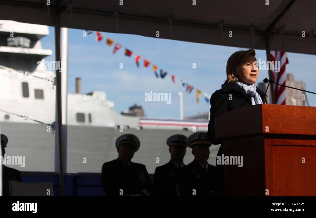 U.S. Secretary of State Hillary Rodham Clinton speaks as the USS New ...