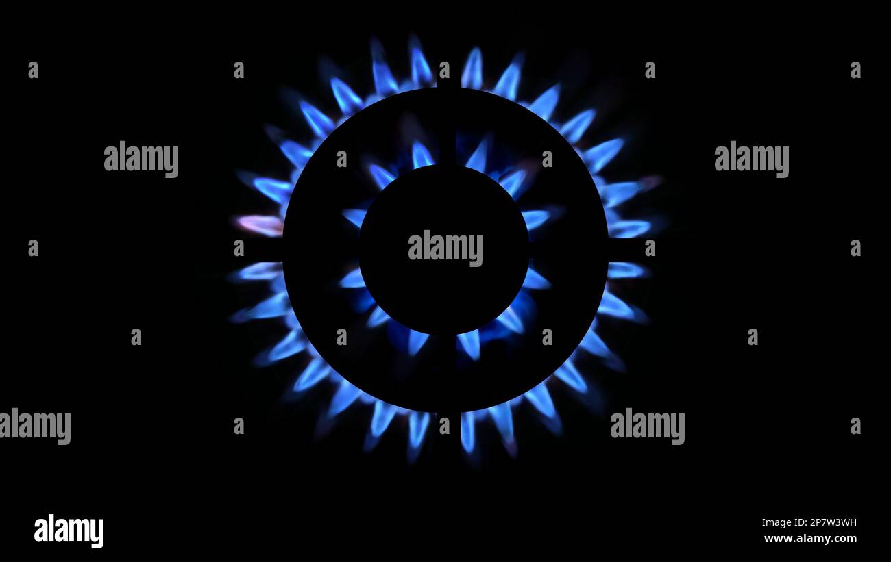 3D rendering of a kitchen burner glowing at night, close up. Natural ...