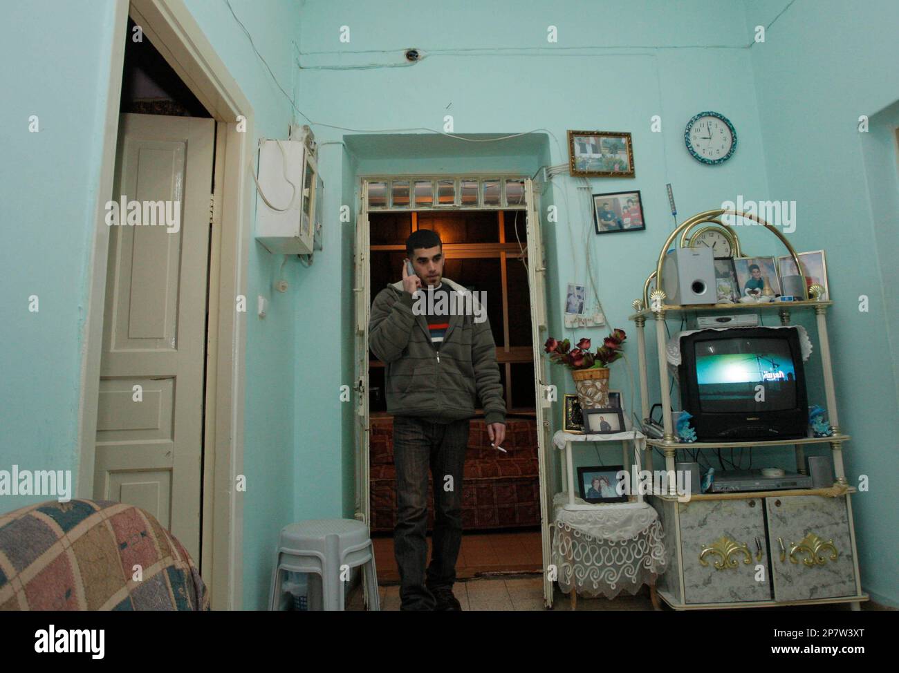 Mohammed Malik Hasan, a cousin of the Maj. Nidal Malik Hasan, walks ...