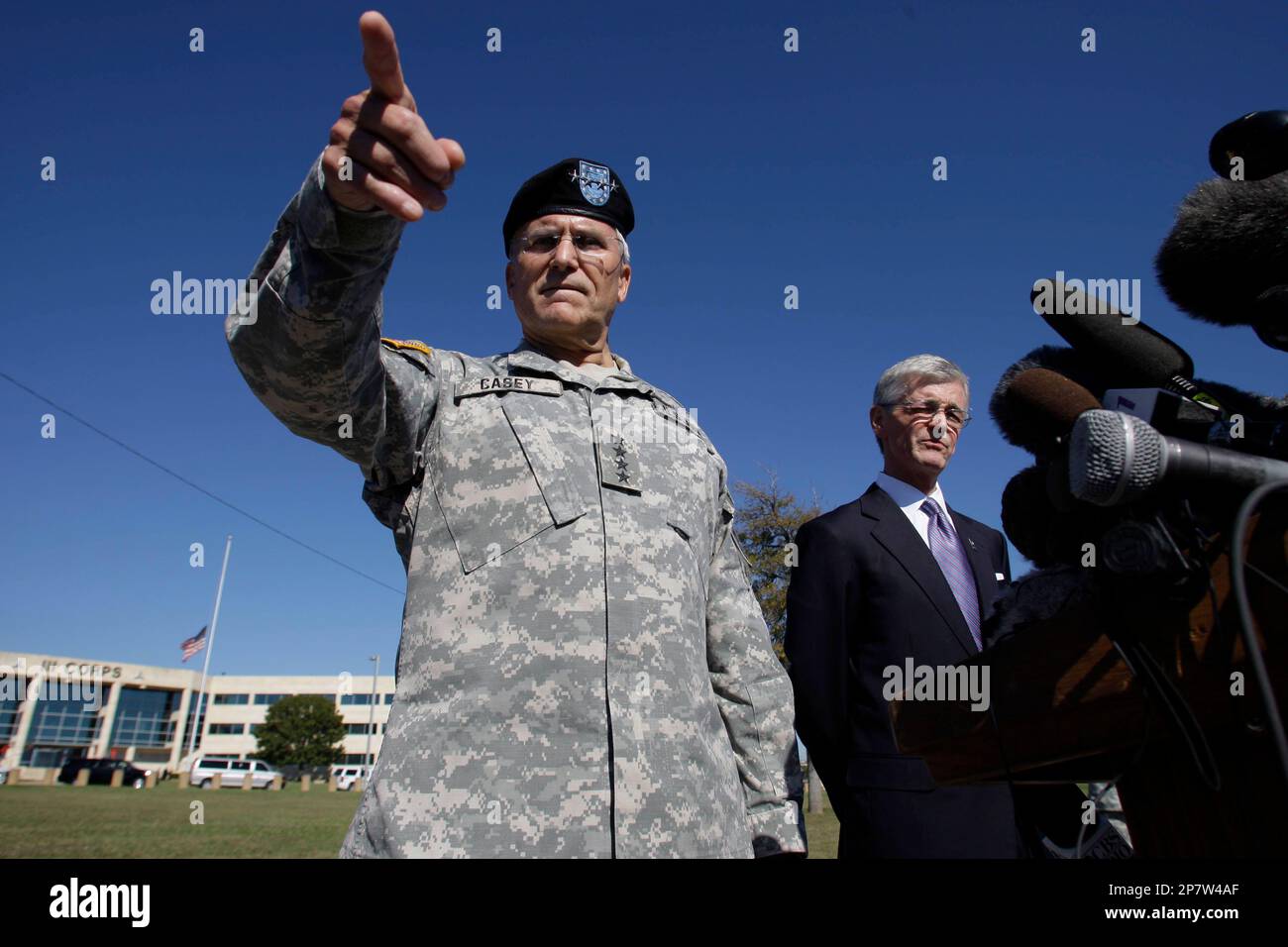 Army Chief of Staff Gen. George Casey, left, points to a reporter for a ...