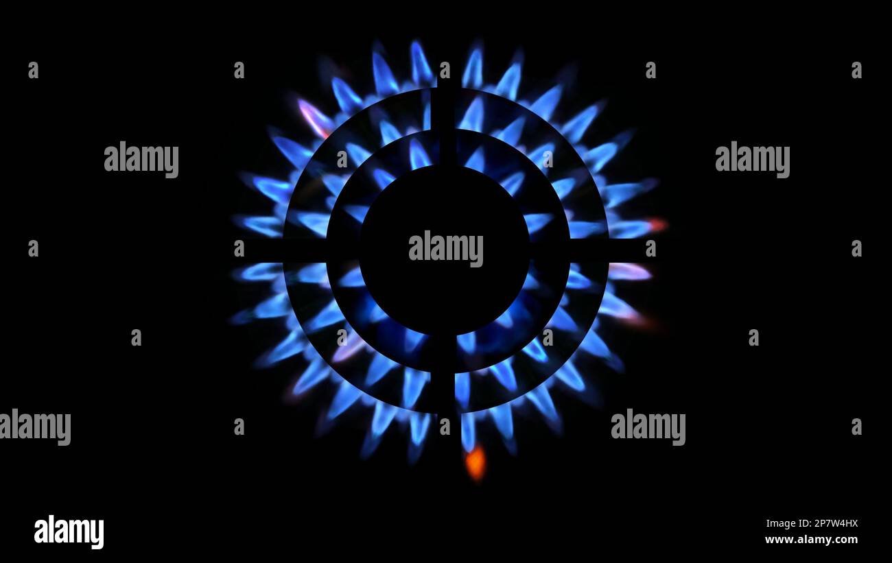 3D rendering of a kitchen burner glowing at night, close up. Natural ...