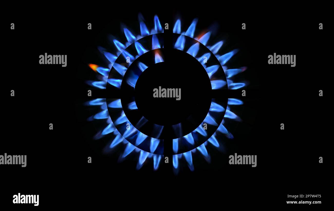 3D rendering of a kitchen burner glowing at night, close up. Natural ...