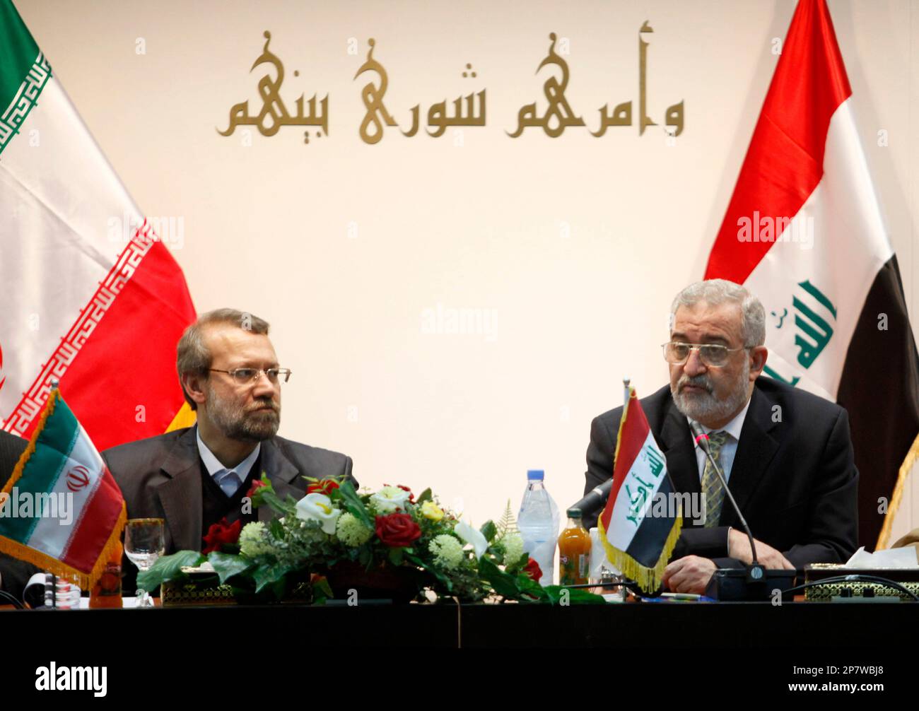 Iraqi Parliament speaker Ayad al-Samarai, right, speaks next to his ...
