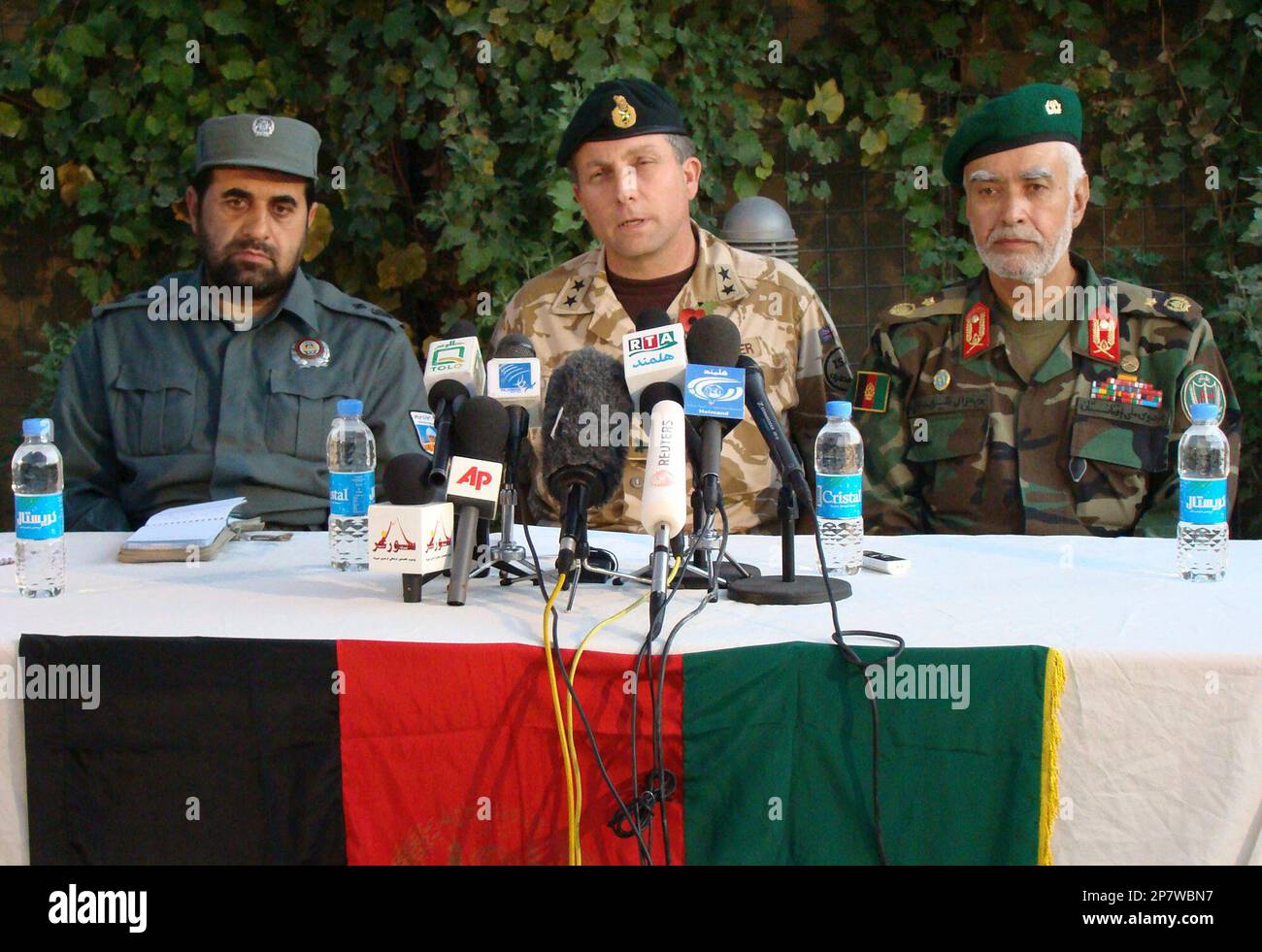 British Maj. Gen. Nick Carter, center, answers journalists questions ...